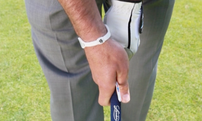 Check your grip with a tee